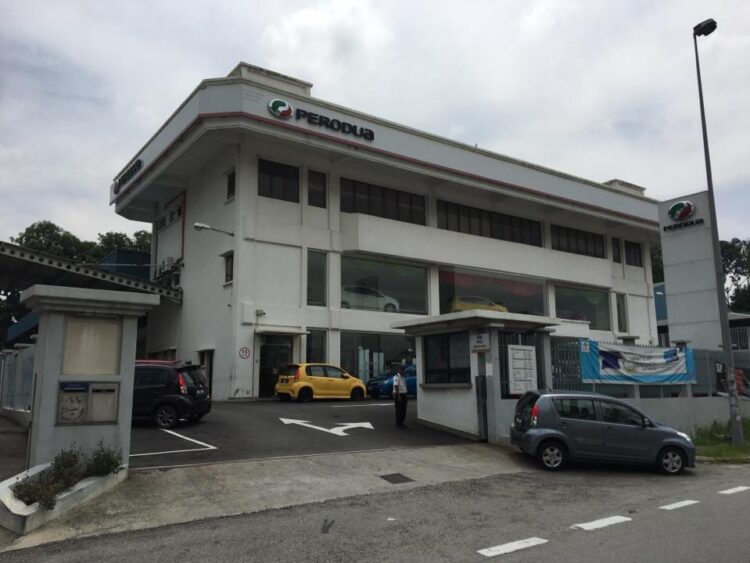 Perodua Balakong staff fails to engage hand brake, causes 2 ...