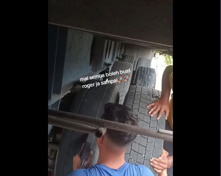 Viral video of worker cutting treads into worn lorry tyre raises ...